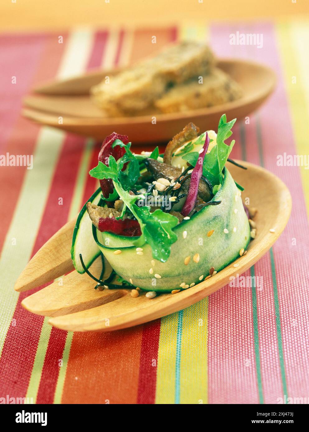 Sauteed seitan and seaweed salad Stock Photo - Alamy