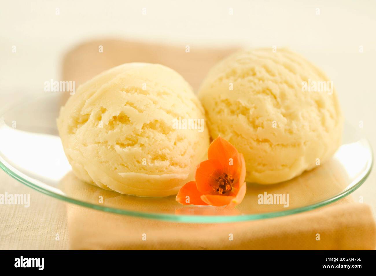 Two scoops of vanilla ice cream Stock Photo - Alamy