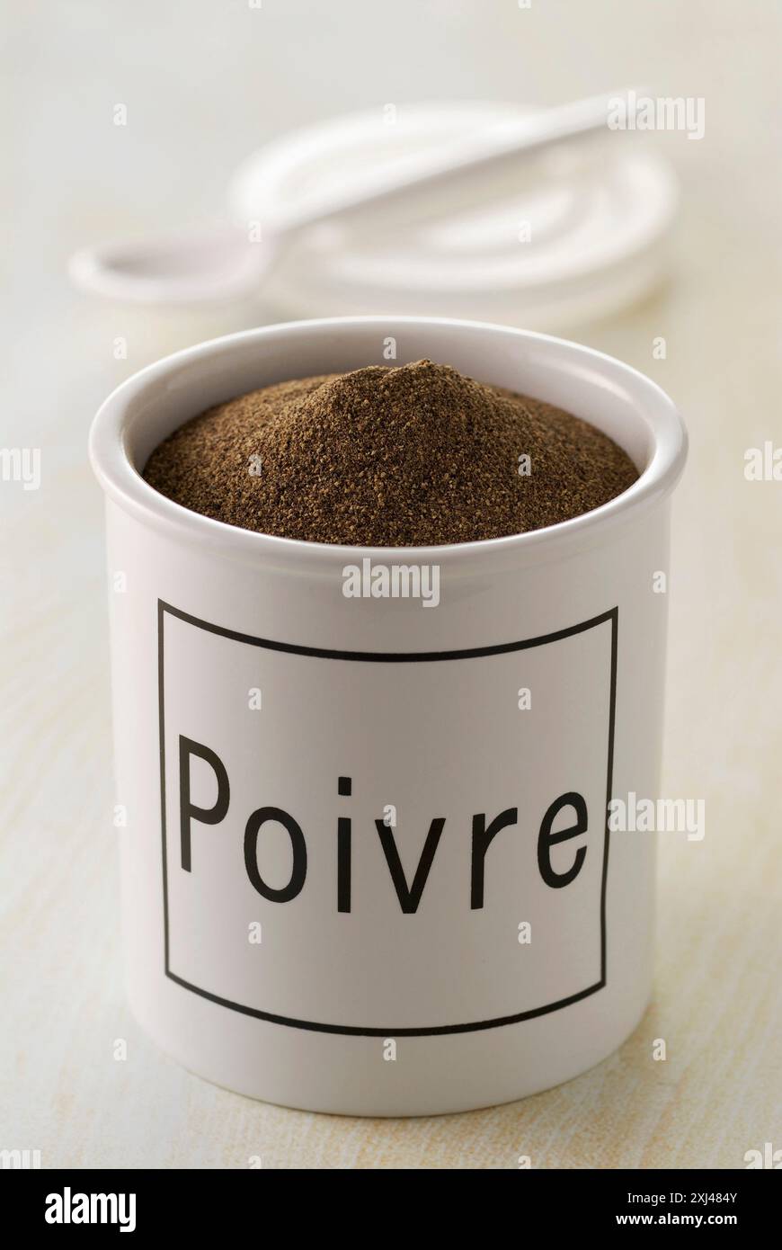 Pot of ground black pepper Stock Photo - Alamy