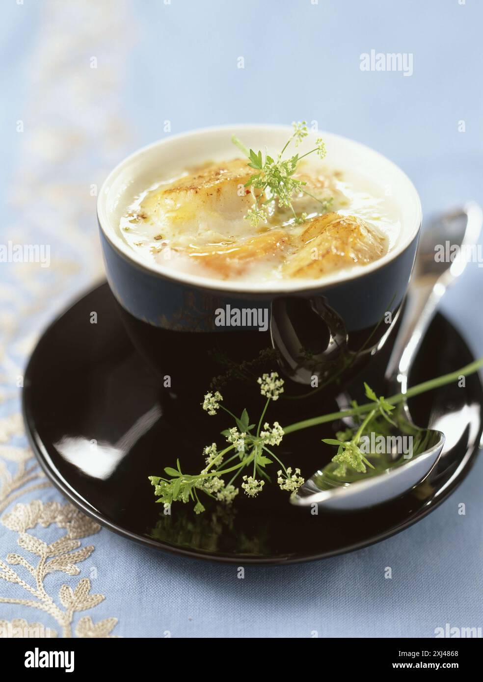Cream of coco bean and scallop soup Stock Photo - Alamy