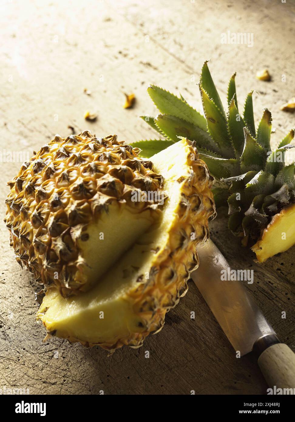 Pineapple cut in half Stock Photo - Alamy