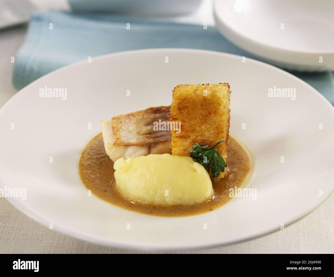 Trigle hirondelle with mashed potatoes and sauce Stock Photo - Alamy