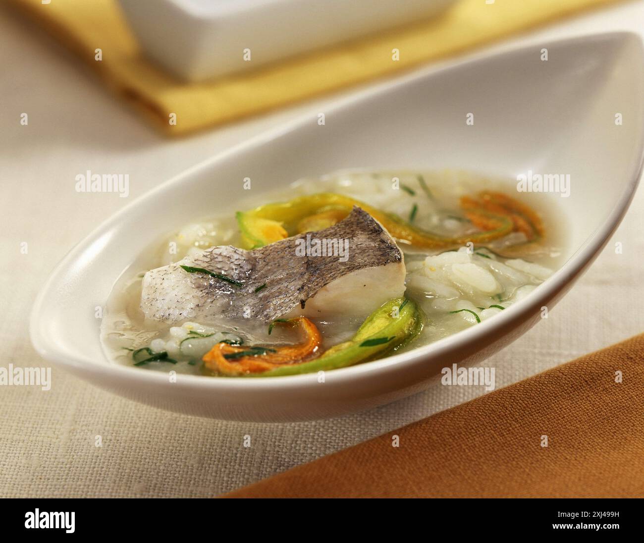 Rice and vegetables with hake Stock Photo - Alamy
