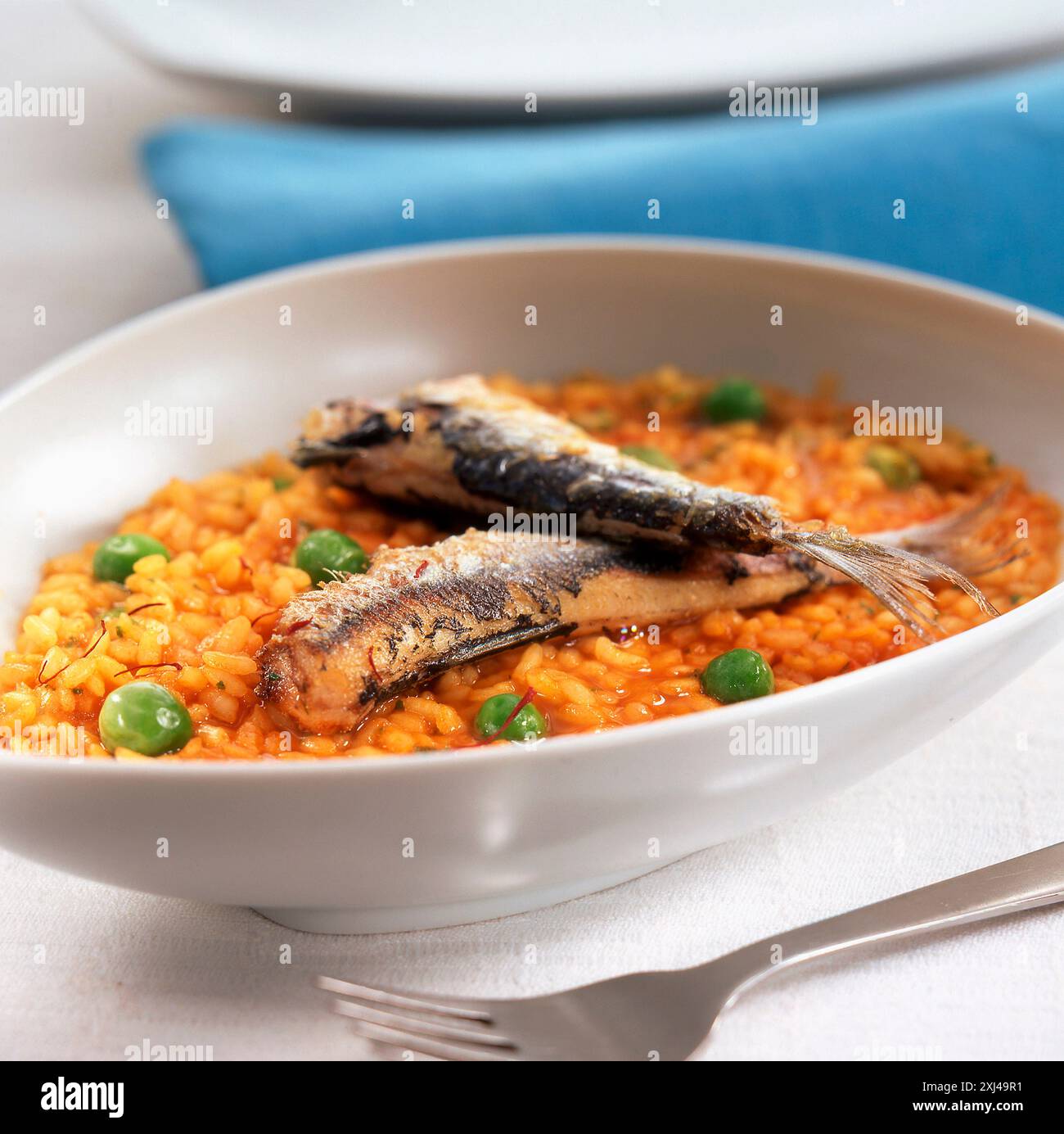Rice with sardines Stock Photo - Alamy