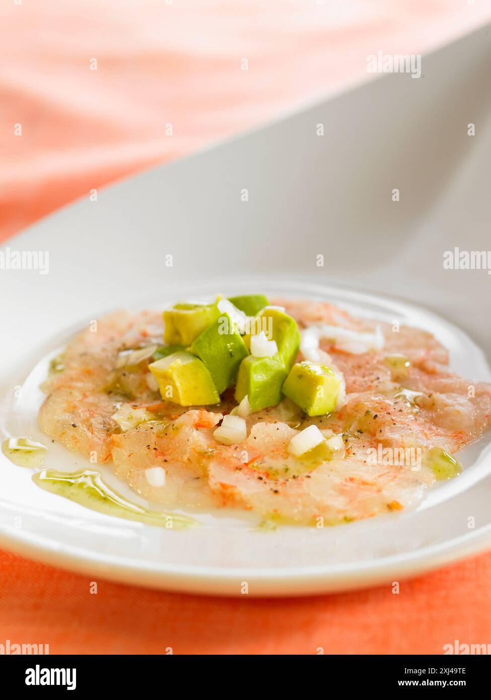 shrimp carpaccio and avocado Stock Photo - Alamy