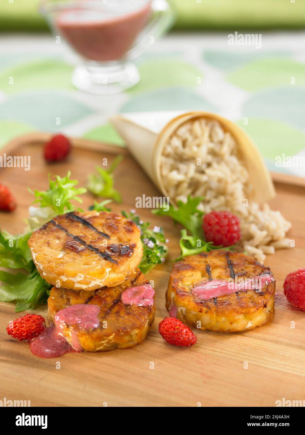 Tempeh with sauce Stock Photo - Alamy