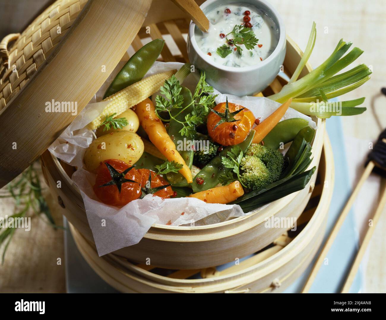 Vegetable Papillote with chervil cream Stock Photo - Alamy