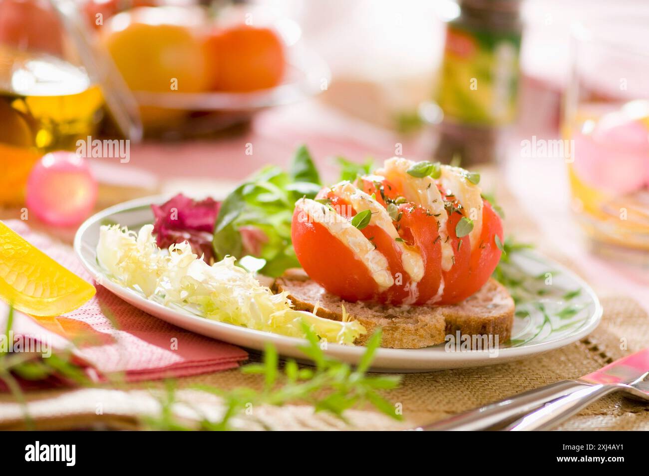 Tomato and goat's cheese layer Stock Photo - Alamy