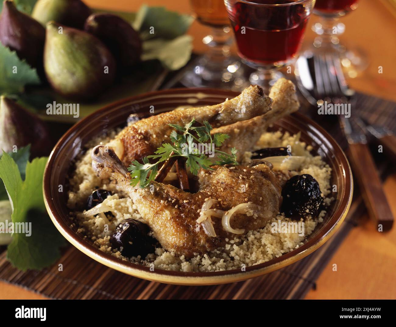 Duck and prune Tajine,cinnamon and semolina Stock Photo - Alamy