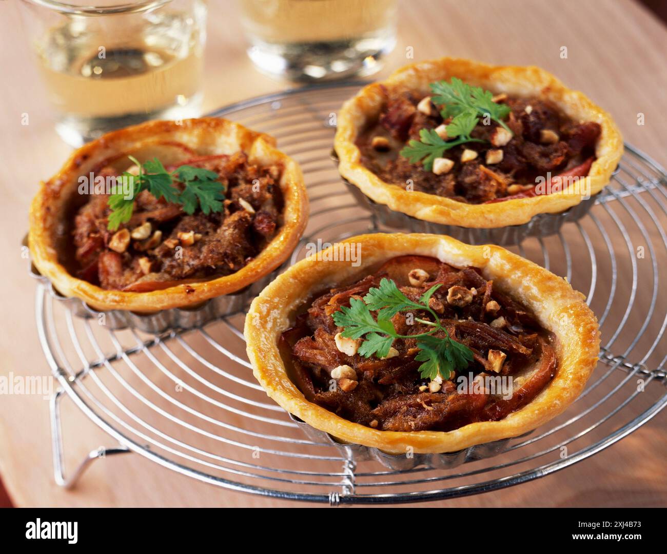 Duck conserve and apple tartlets Stock Photo - Alamy