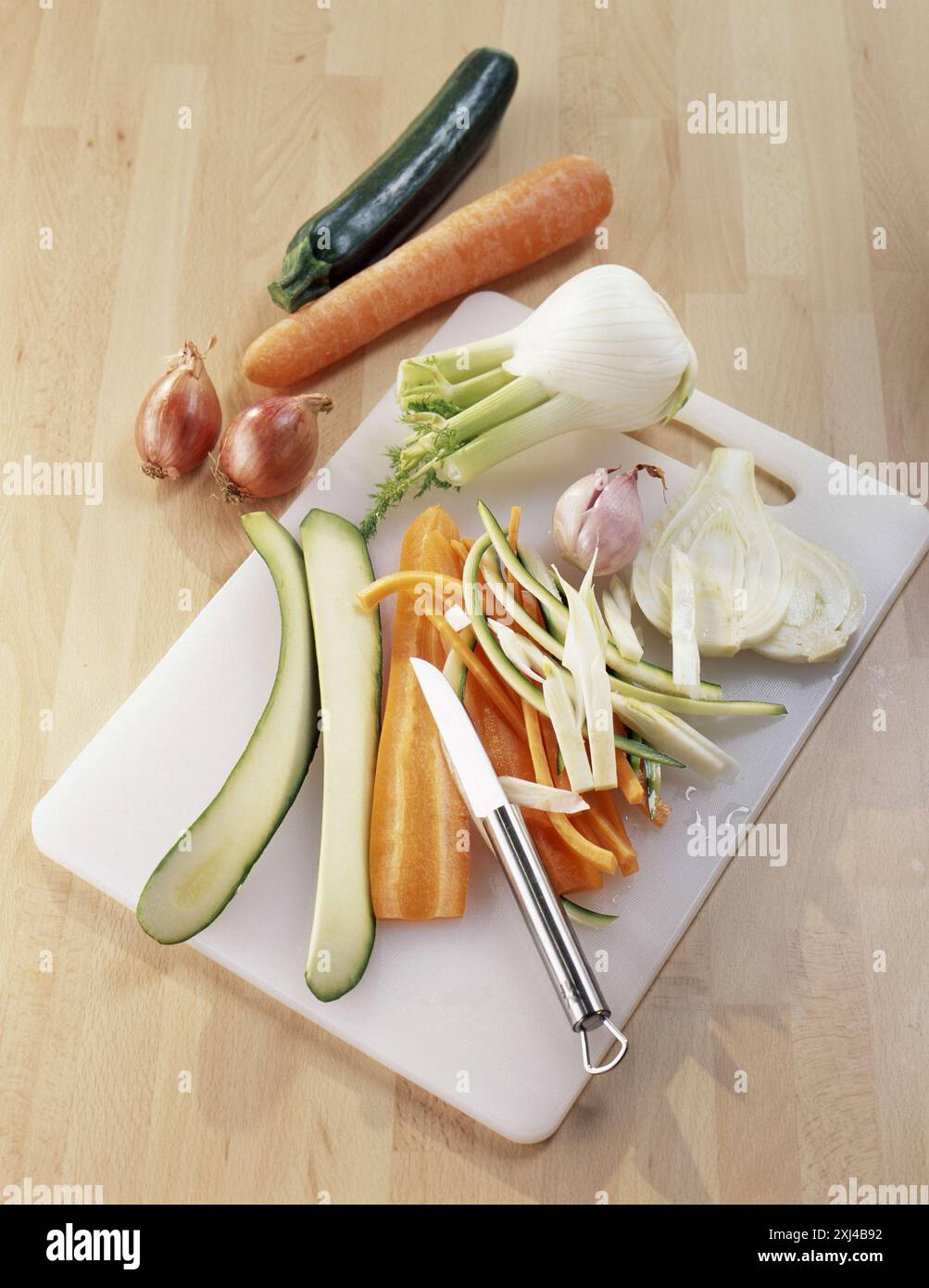 Slicing the vegetables Stock Photo - Alamy
