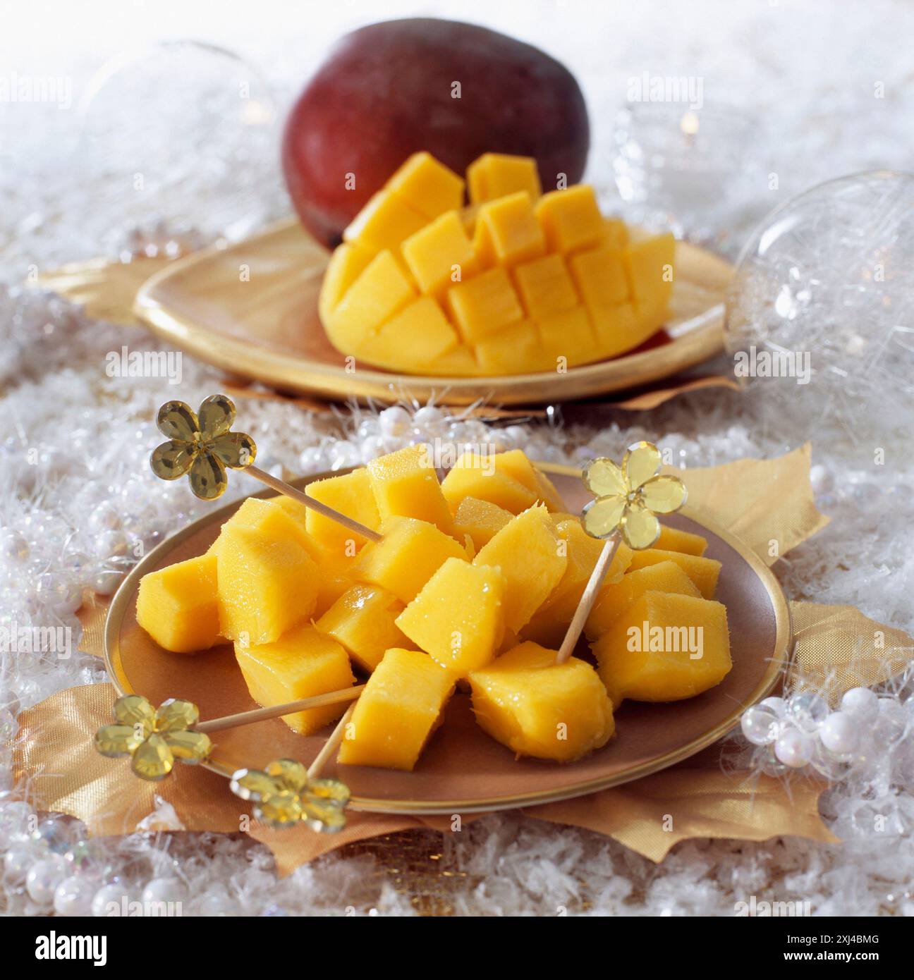 Aperitif diced mango Stock Photo - Alamy