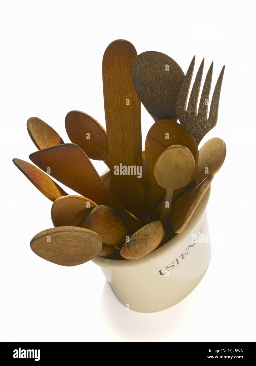 Wooden spoons in a pot Stock Photo - Alamy