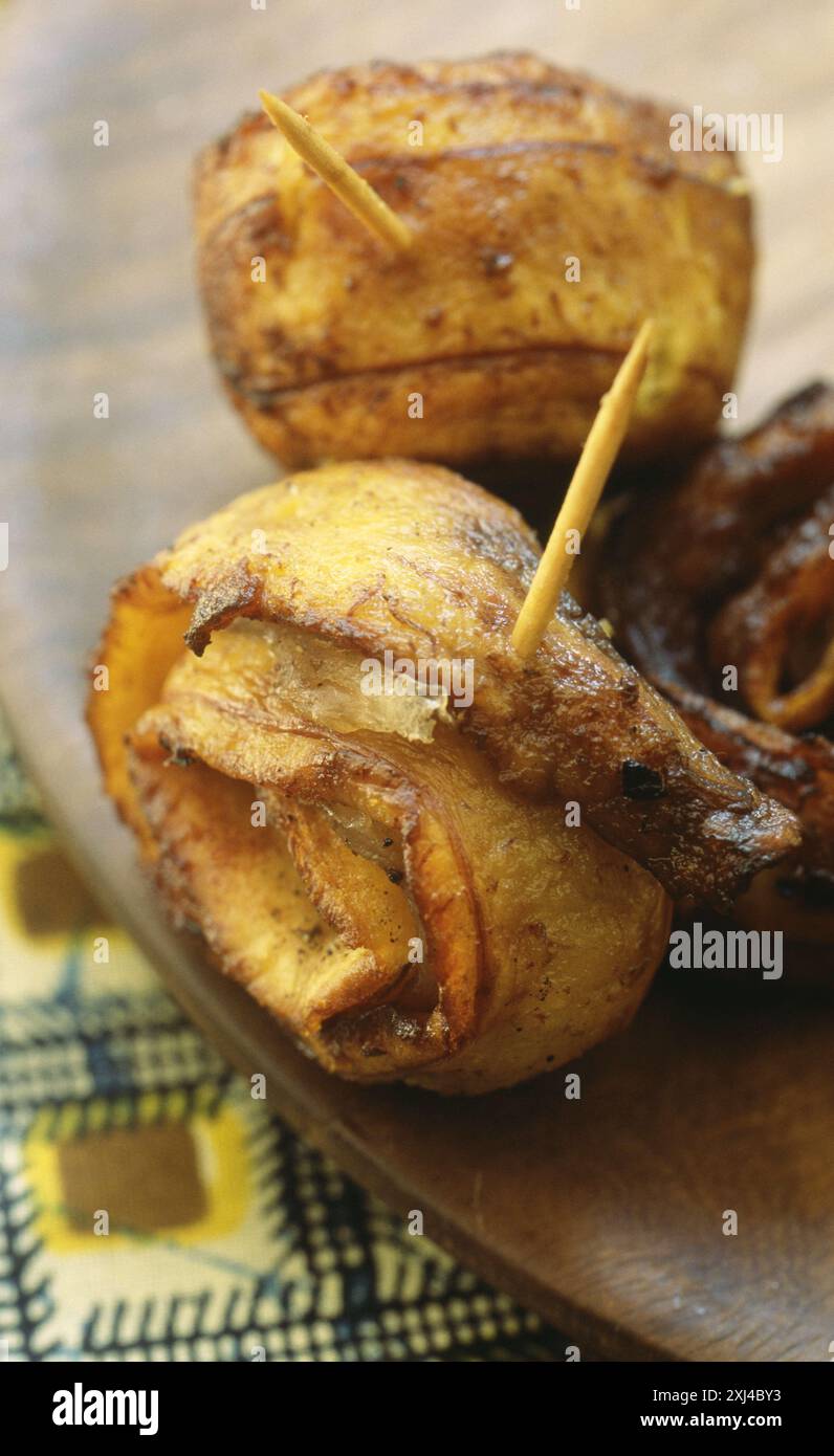 Smoked fish fried rolls and plantain bananas Stock Photo - Alamy