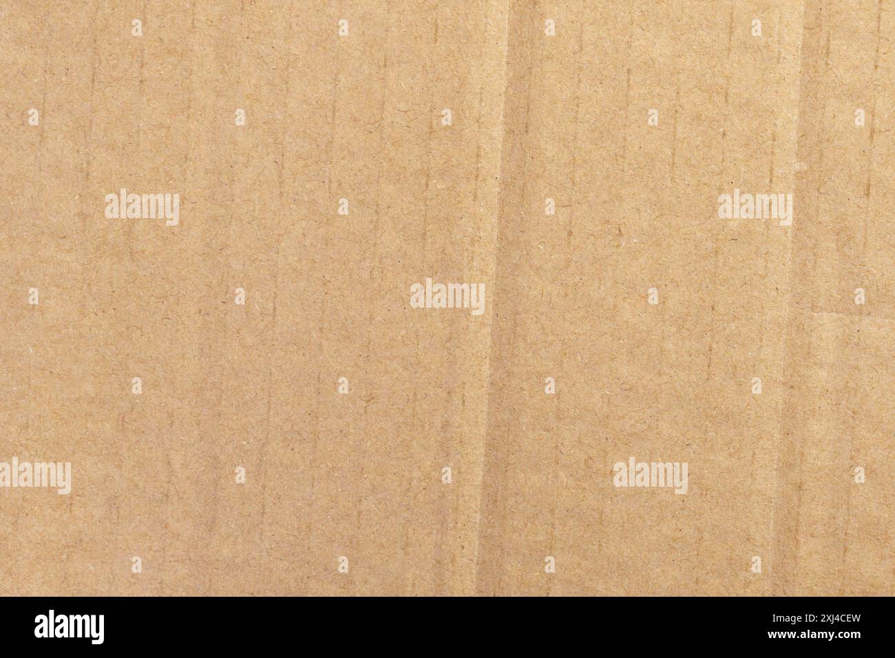 Cardboard striped used folded box texture close up. Brown paper package ...