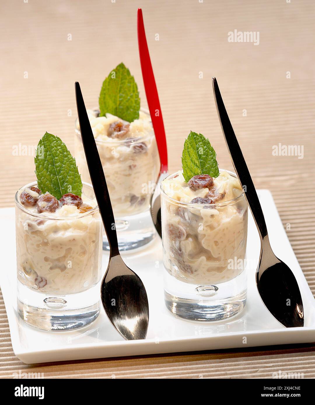 Rice pudding with rum and raisins in Verrines Stock Photo - Alamy