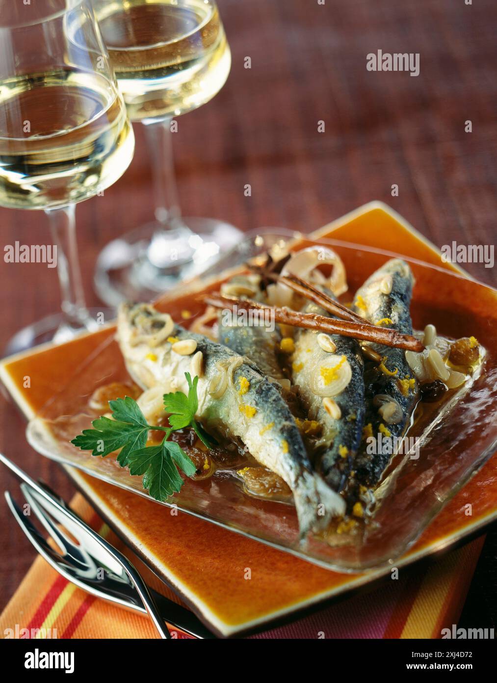Spicy, sweet and sour marinated sardines Stock Photo - Alamy