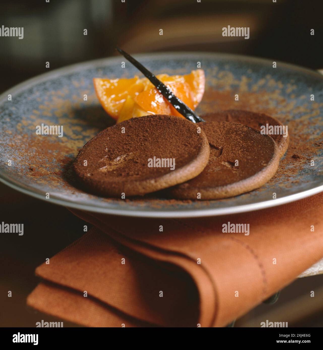 Chocolate blinis with confit clementines Stock Photo - Alamy