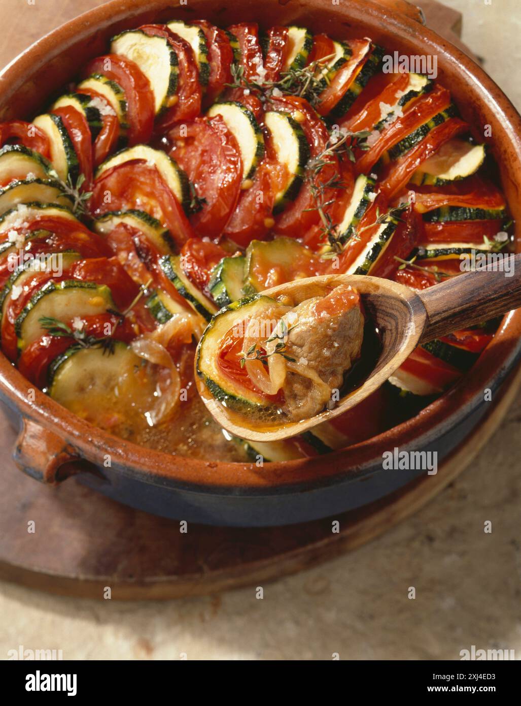 Lamb and courgette Tian Stock Photo - Alamy