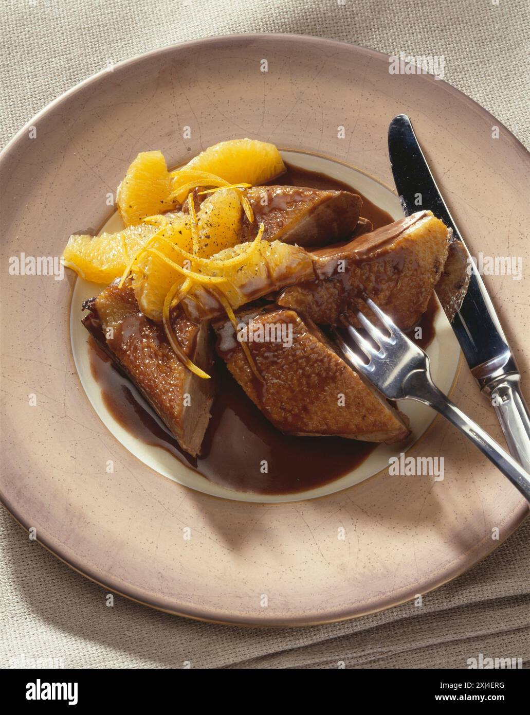 Goose civet with citrus fruit and cocoa Stock Photo - Alamy