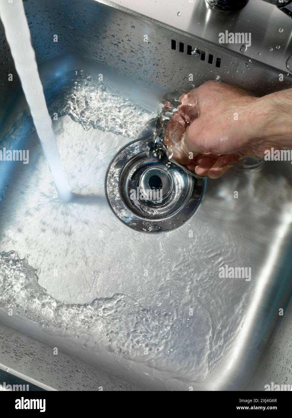 taking the siphon out of the sink Stock Photo - Alamy
