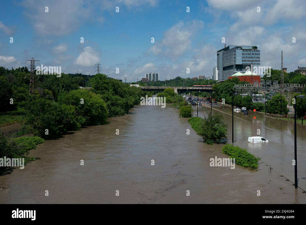 The Don River overflows causing flooding surrounding on roads following ...