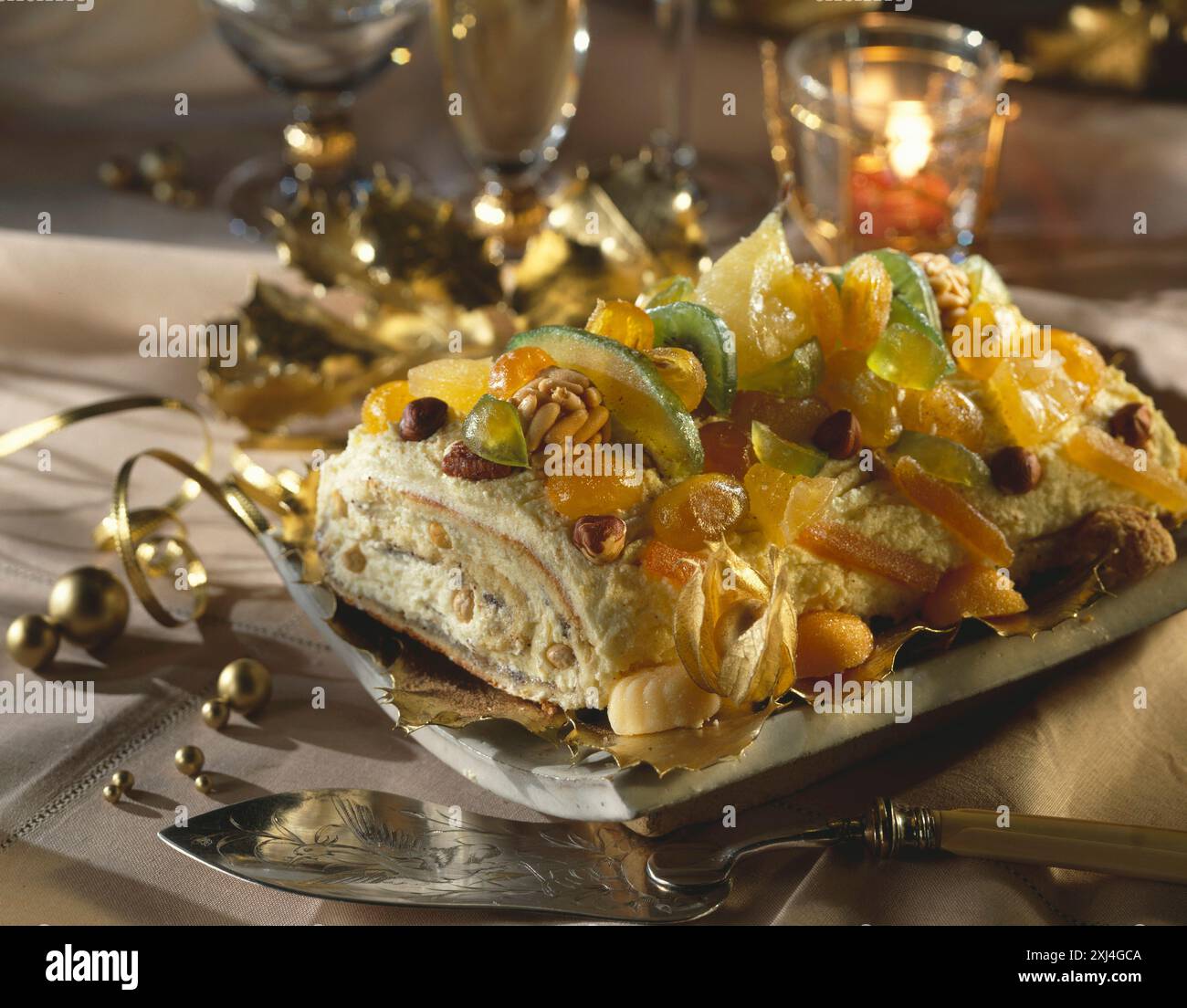 Confit fruit and dried fruit log cake Stock Photo - Alamy