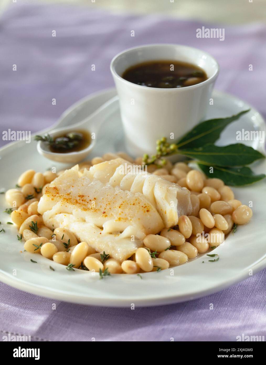 Cod with haricot beans Stock Photo - Alamy
