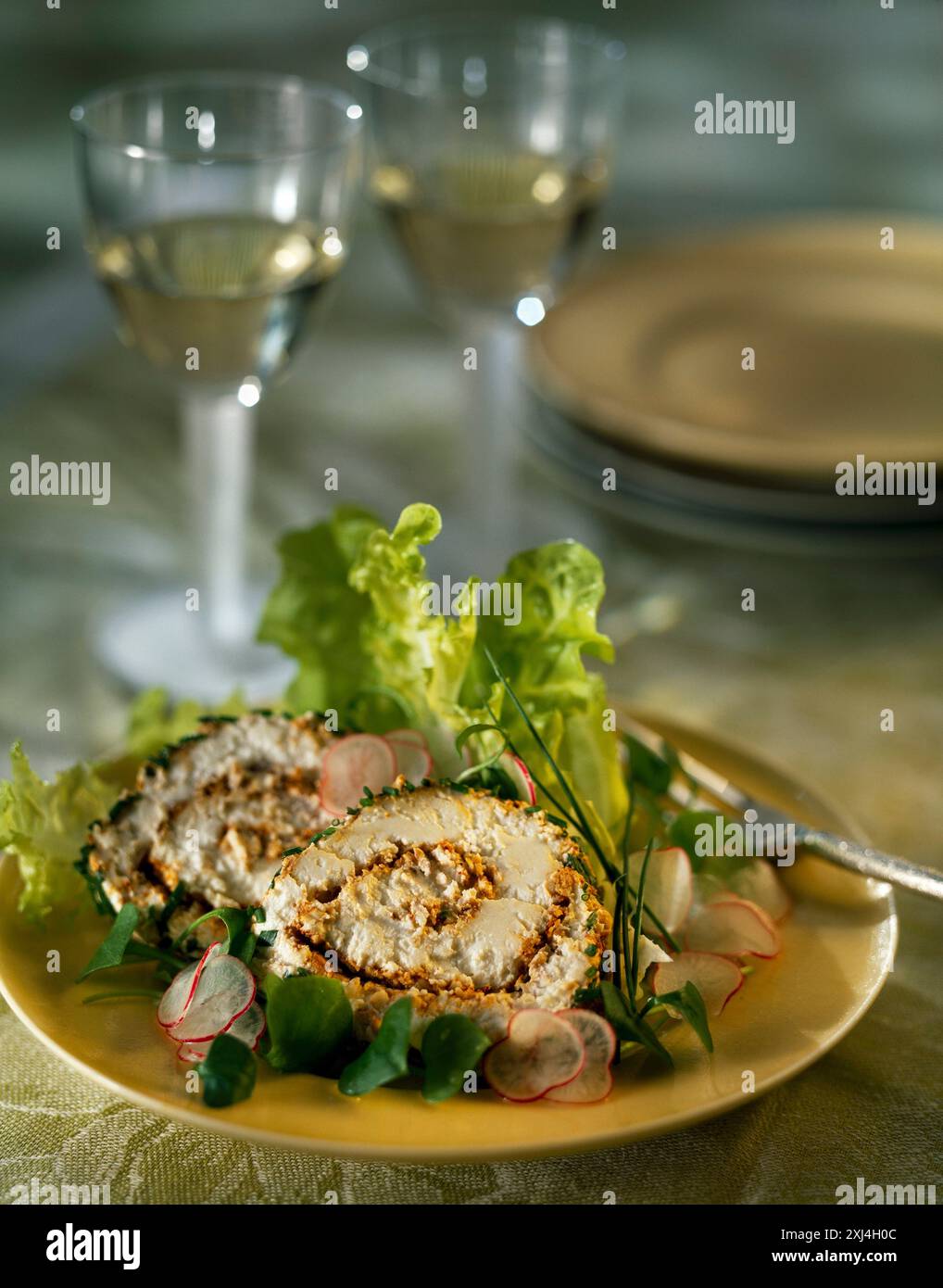 Goat's cheese and herb sliced log Stock Photo - Alamy