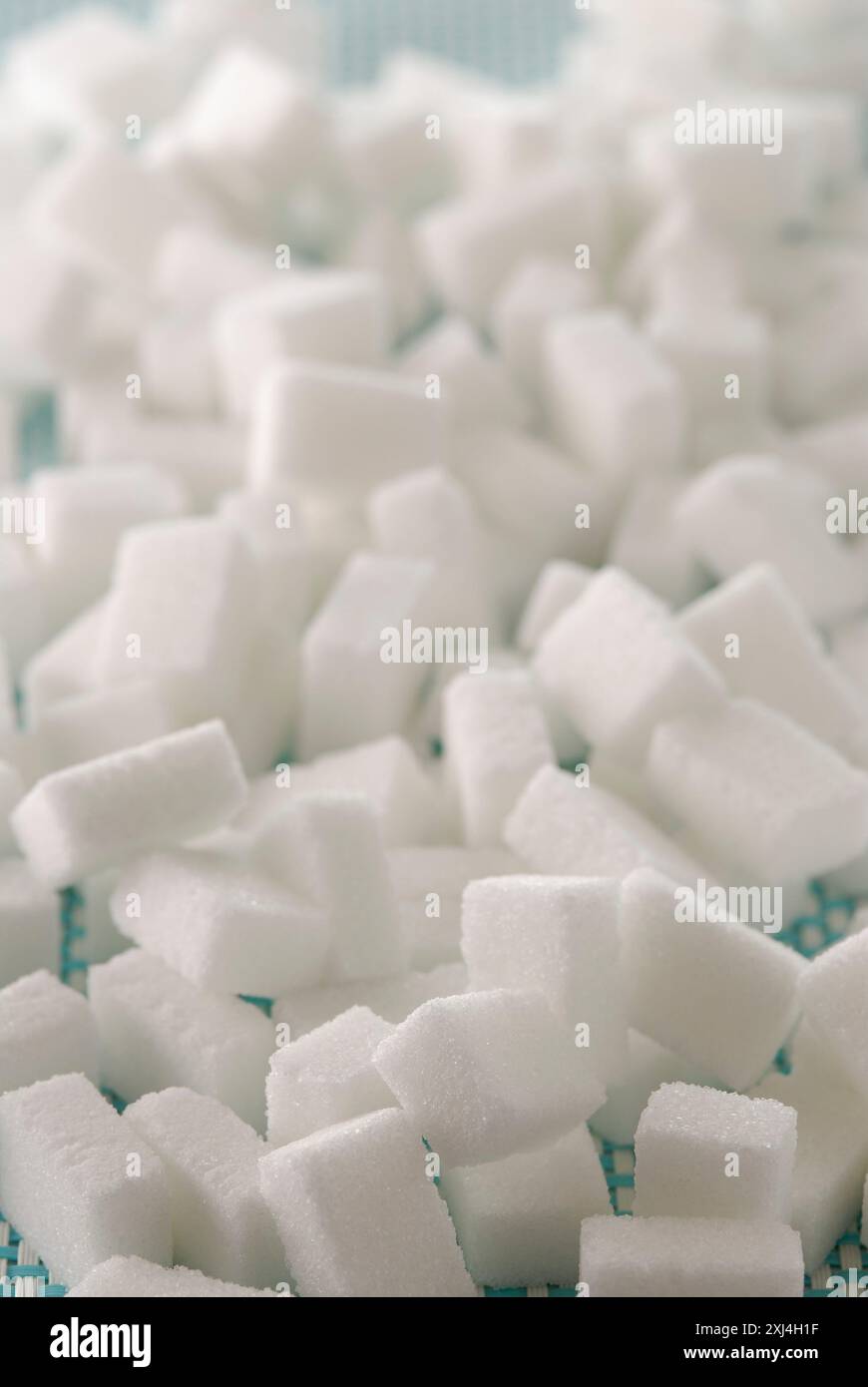 Heap of sugar lumps Stock Photo - Alamy