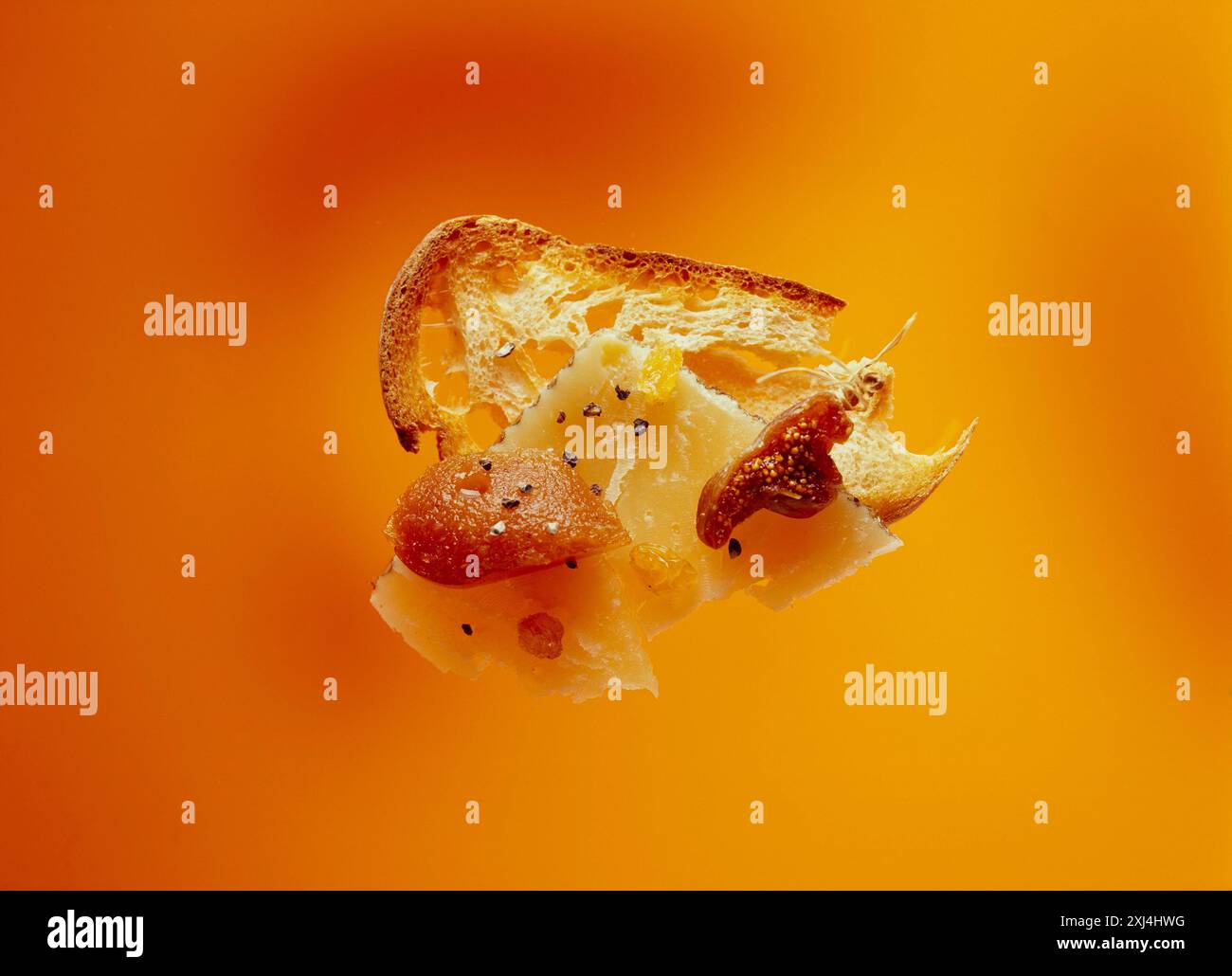 Slice of bread with parmesan ,fig and quince paste Stock Photo - Alamy