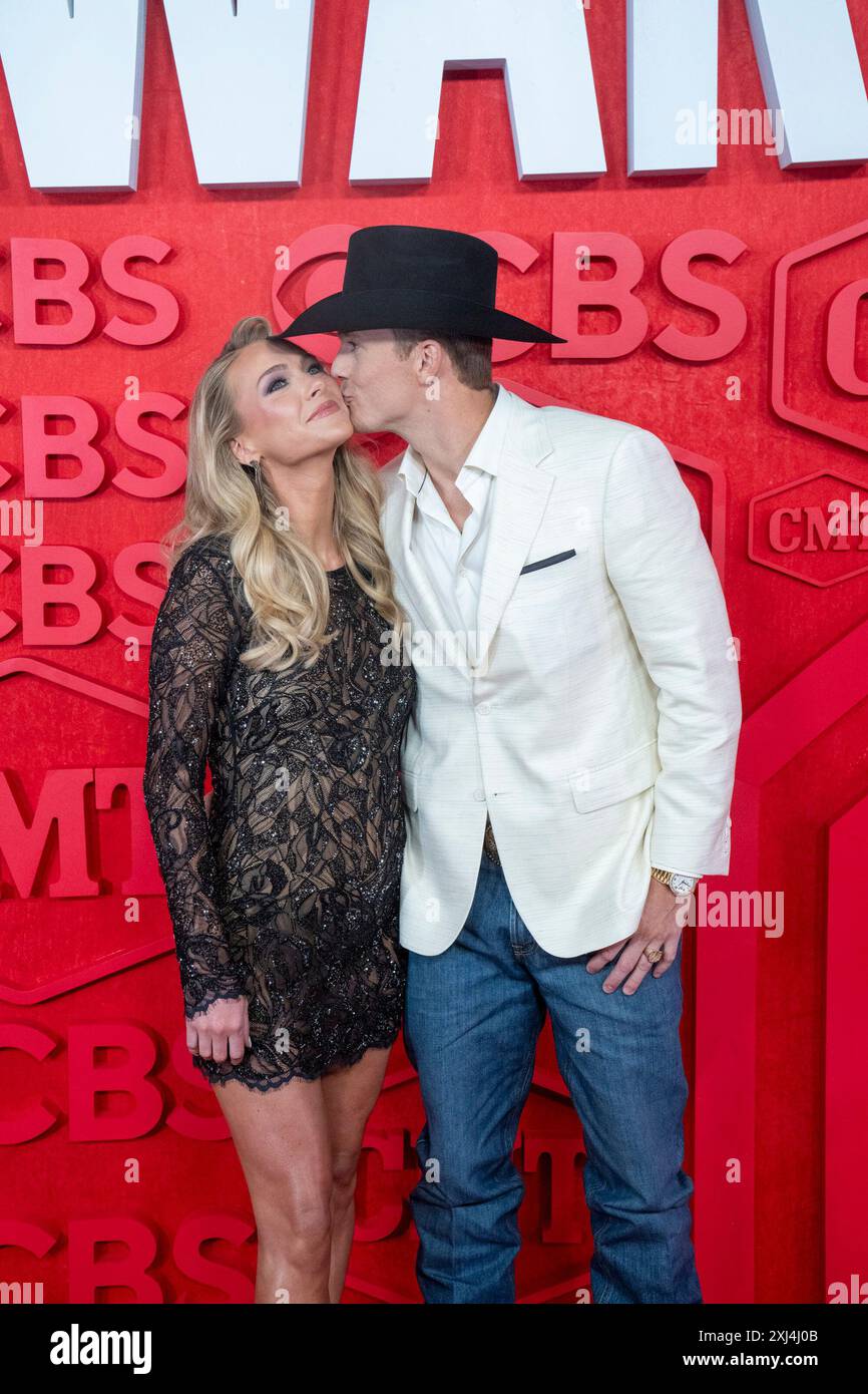 Country singer PARKER MCCOLLOM and wife HALLIE RAY LIGHT walk the red ...