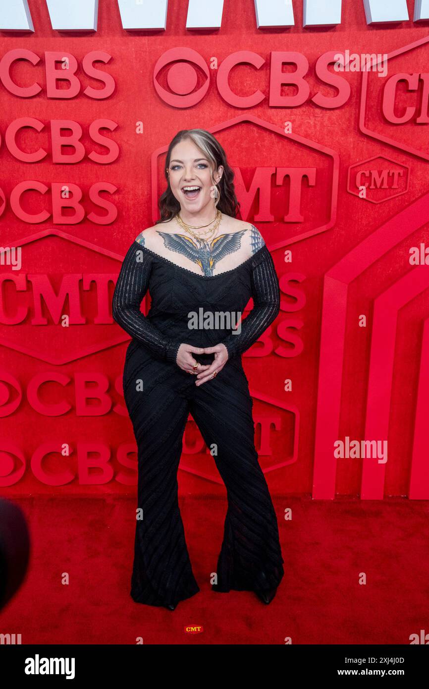 Country singer ASHLEY MCBRYDE walks the red carpet and poses for ...