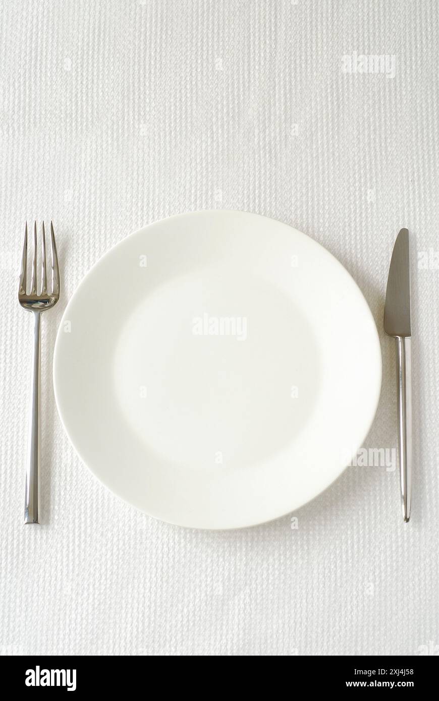 Plate ,knife and fork Stock Photo - Alamy