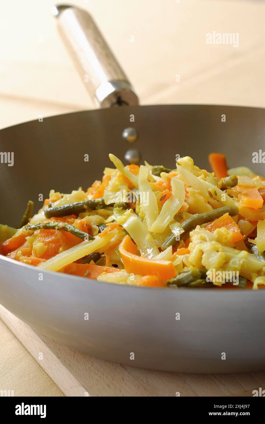 Old-fashioned vegetables cooked in a wok Stock Photo - Alamy