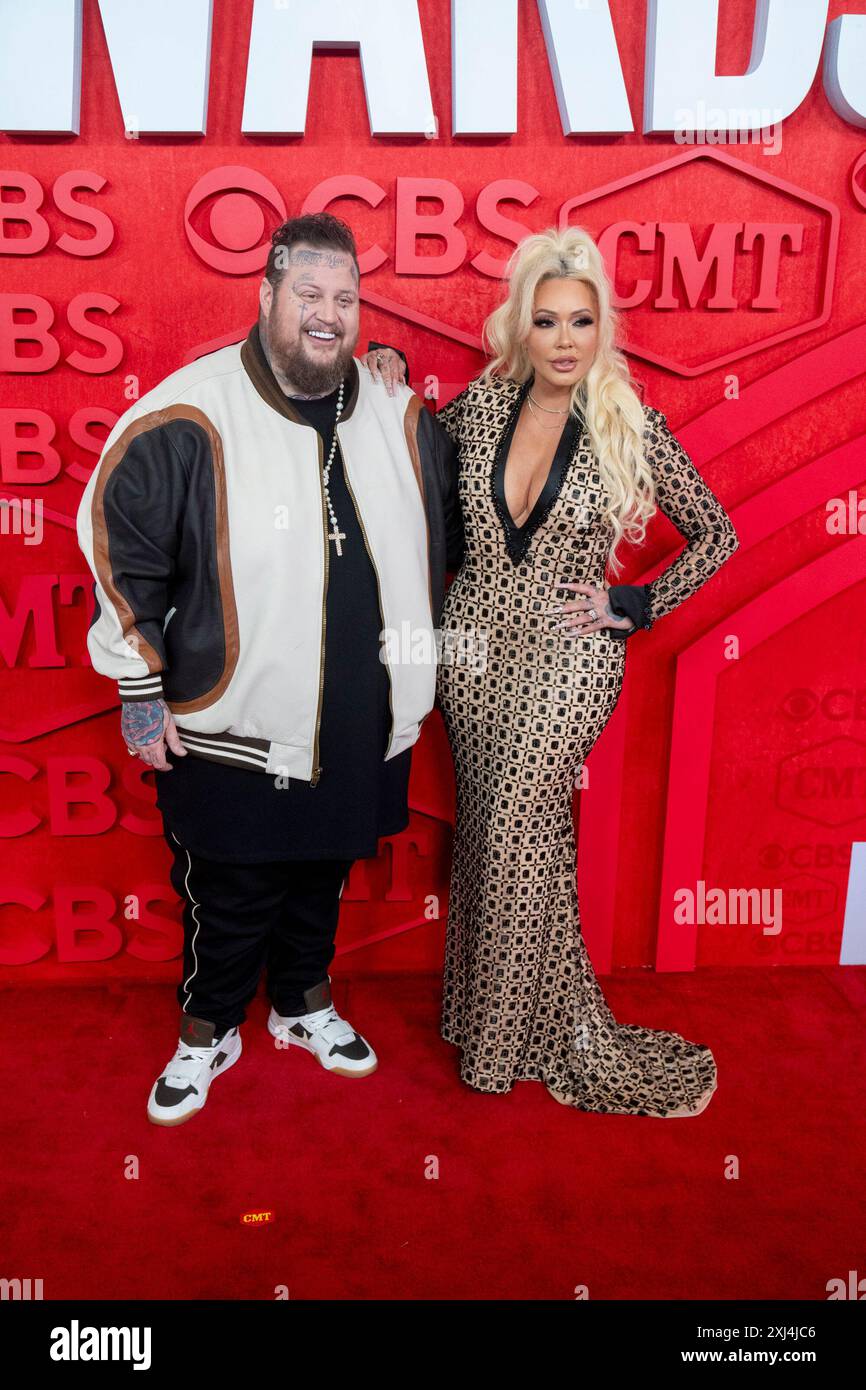 Singer JELLY ROLL and wife ALYSSA DeFORD walk the red carpet and pose ...