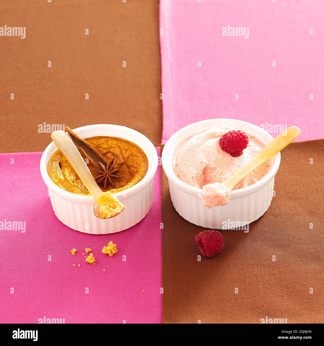Gingerbread baked egg custard,raspberry iced mousse Stock Photo - Alamy