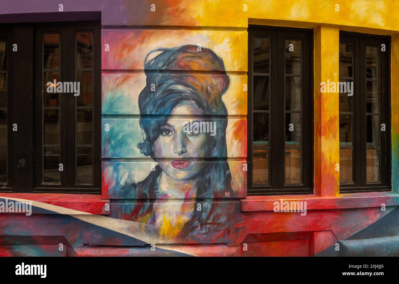 Amy Winehouse painting on the outside wall of the Revolver Club in ...