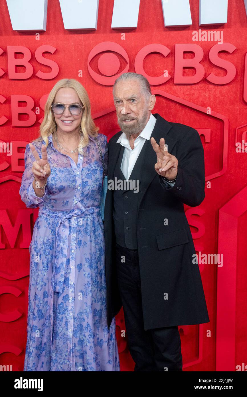 Philanthropists JOHN PAUL DEJORIA and wife ELOISE BROADY walk the red ...