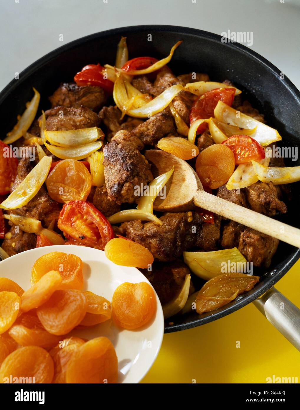 Lamb with dried apricots and spices Stock Photo - Alamy