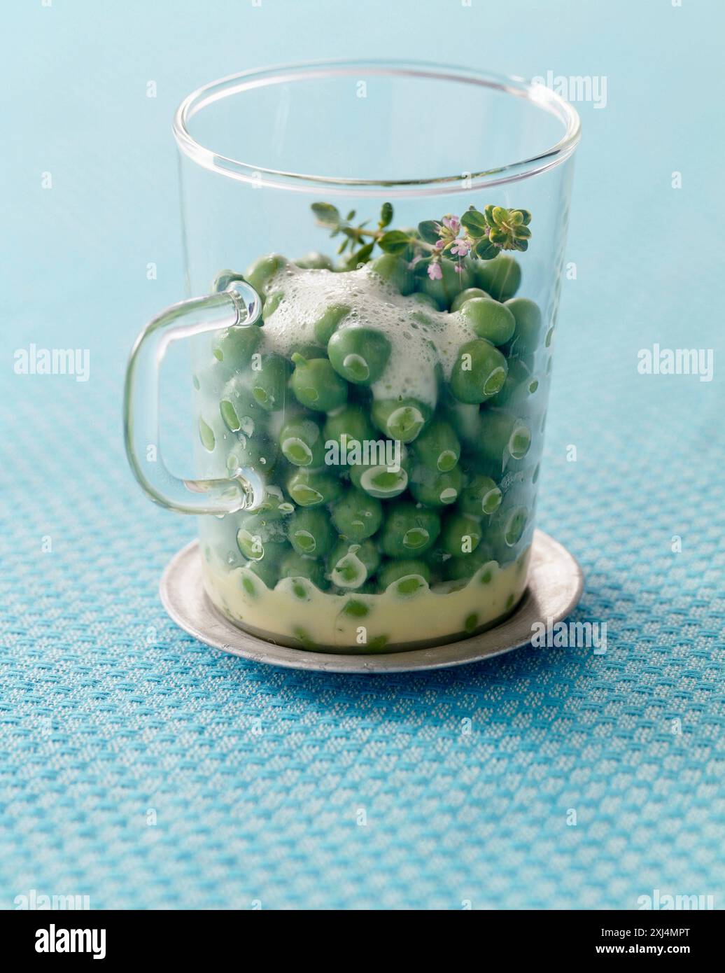 Pea salad with a thyme-flavoured emulsion dressing Stock Photo - Alamy