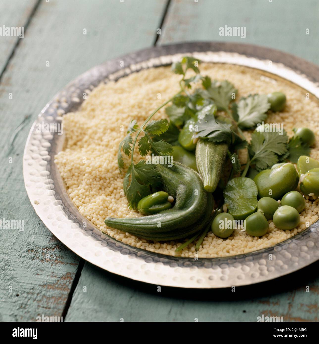 Semolina with green vegetables Stock Photo - Alamy