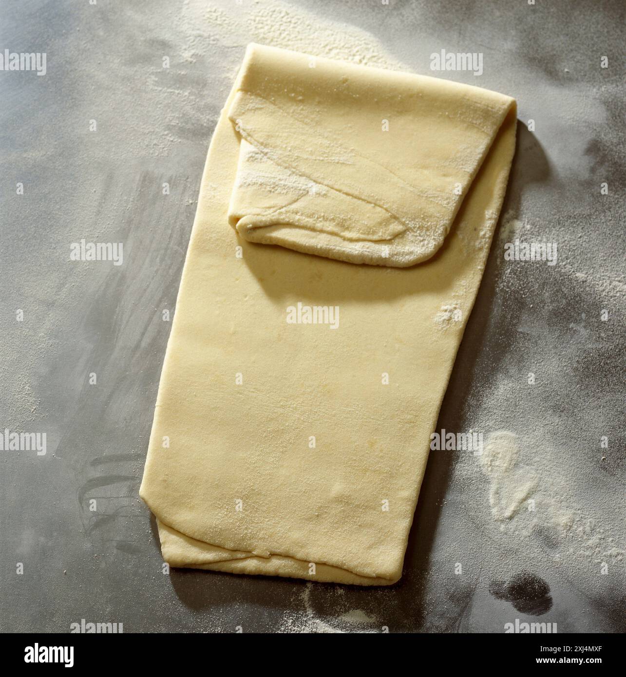 Folding the pastry Stock Photo - Alamy