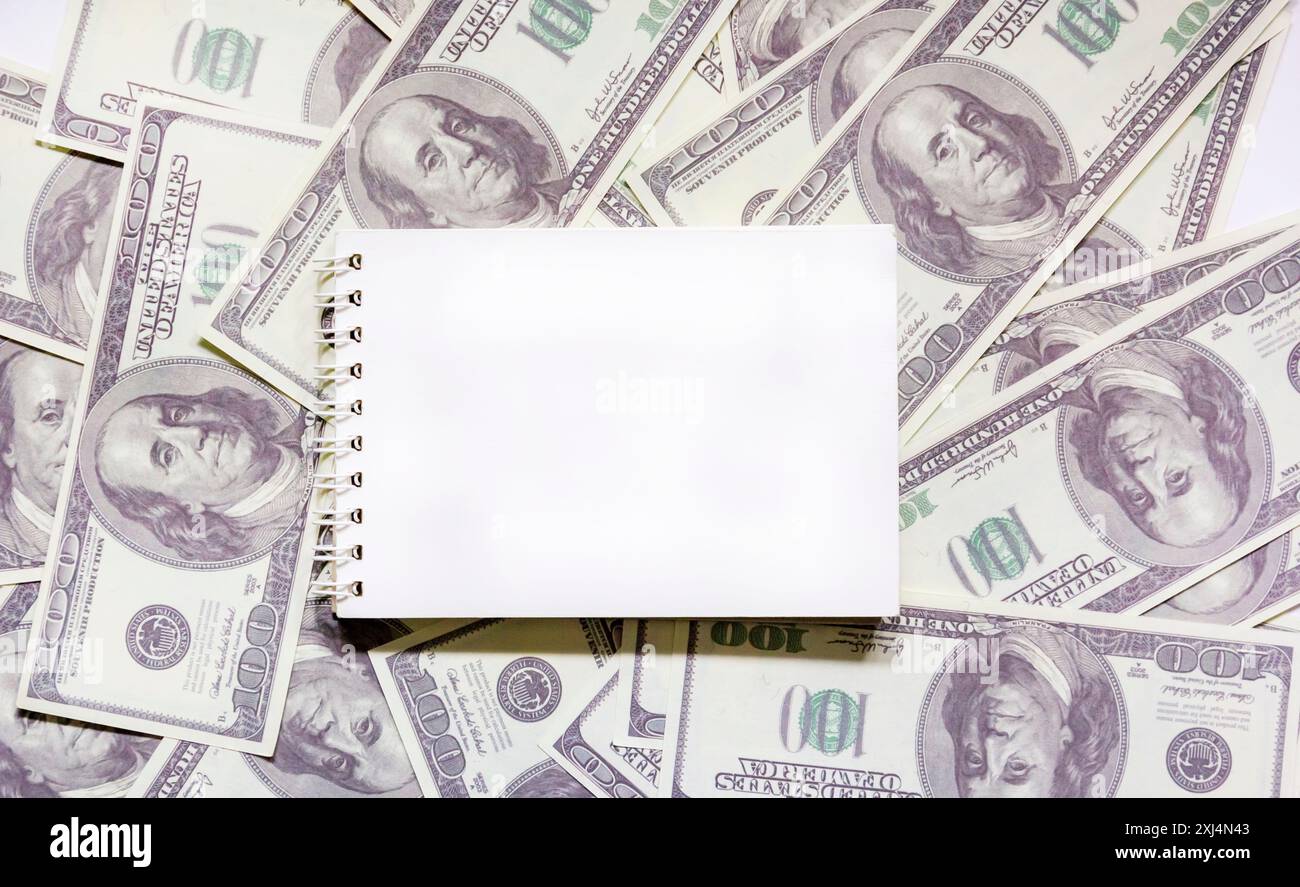 Notepad pen us dollars hi-res stock photography and images - Alamy