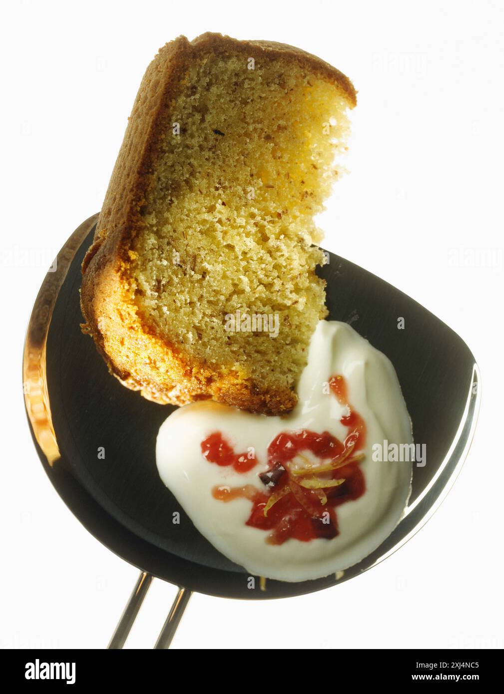 Walnut cake with fromage blanc and strawberry puree Stock Photo - Alamy
