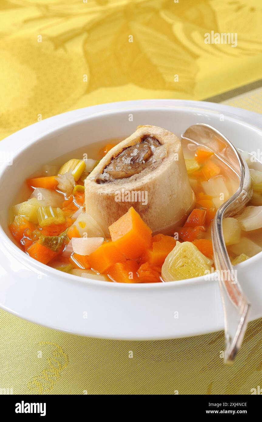 Vegetable soup with marrow bone Stock Photo - Alamy