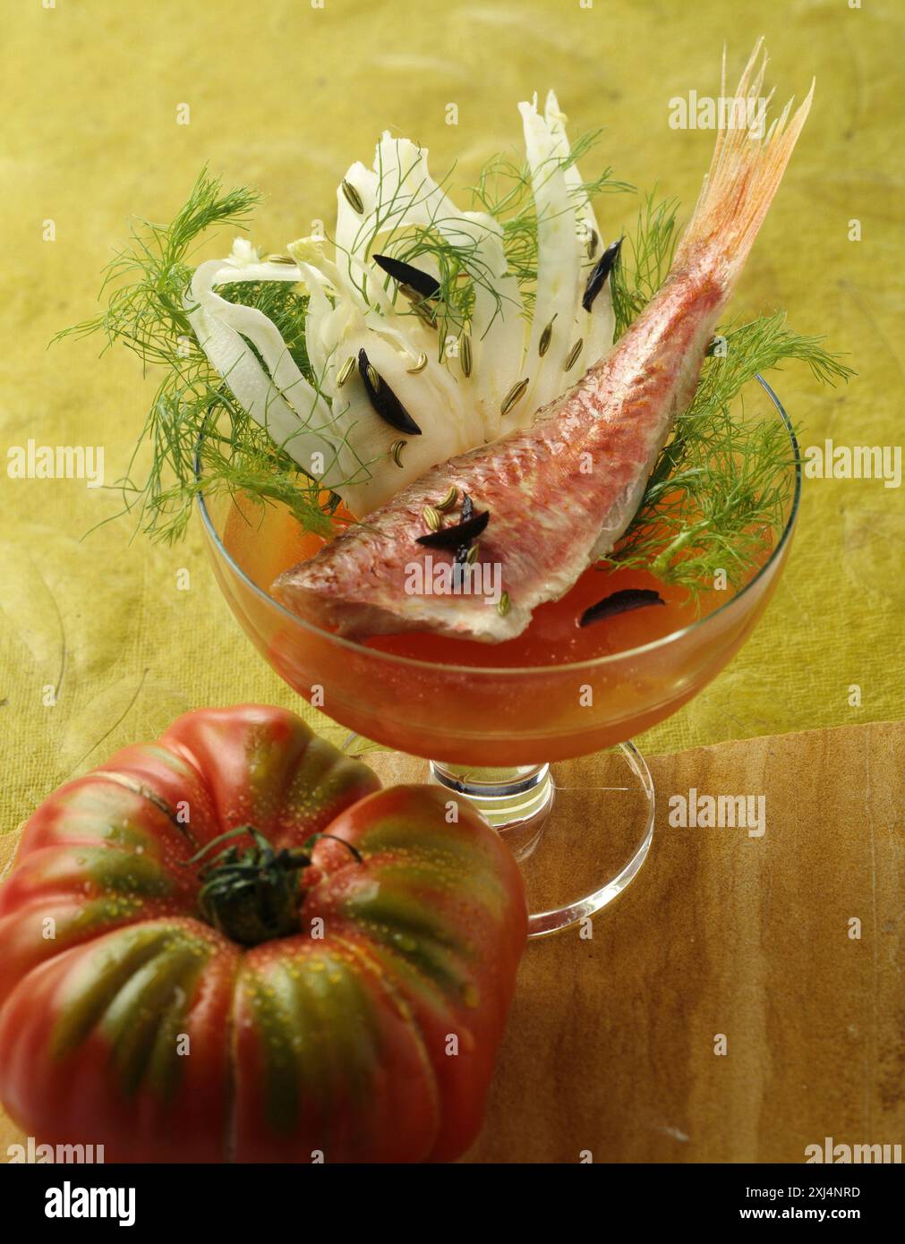 Tomato soup with fennel and red mullet Stock Photo - Alamy