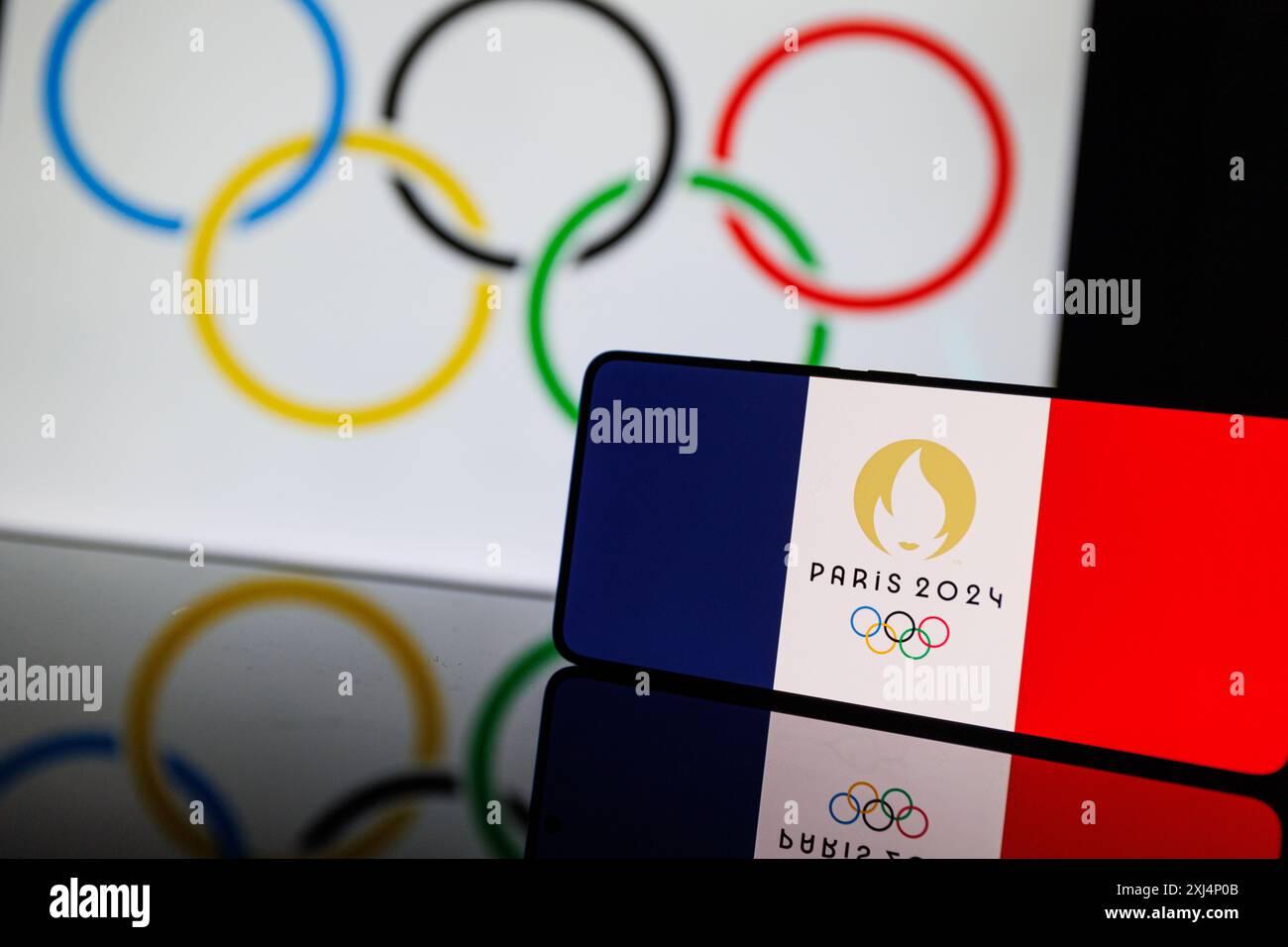 Paris Summer Olympic games logo with France flag in background of ...