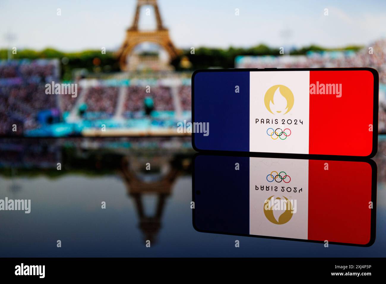 Paris Olympic games logo with France flag in background of Eiffel tower ...