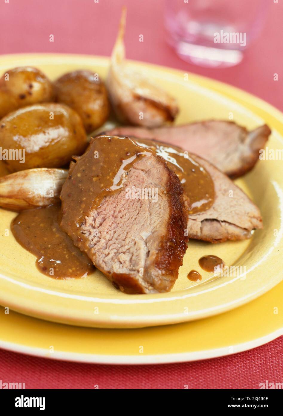 Pork Filet mignon with mustard sauce Stock Photo - Alamy